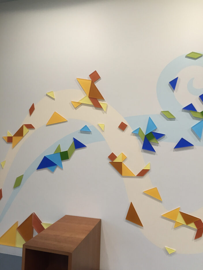 Tangram wall gives kids place to imagine in Kaysville library | News ...